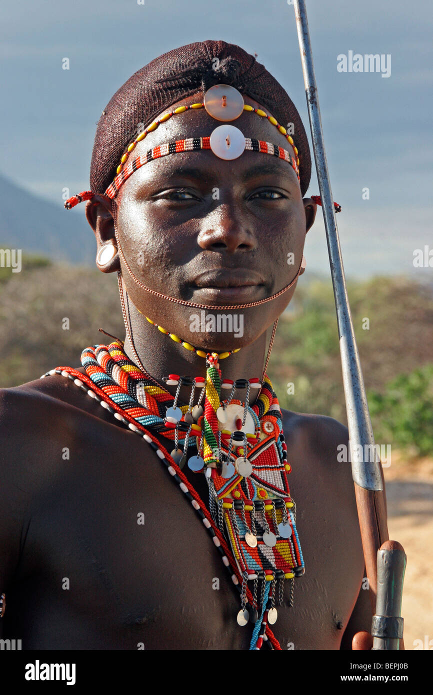 Portrait of Samburu warrior in traditional dress with spear, Kenya ...