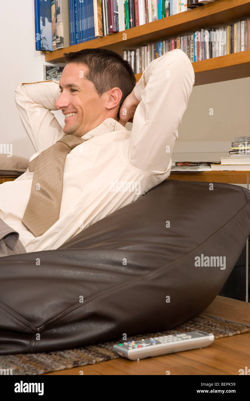 smiling man watching TV Stock Photo - Alamy