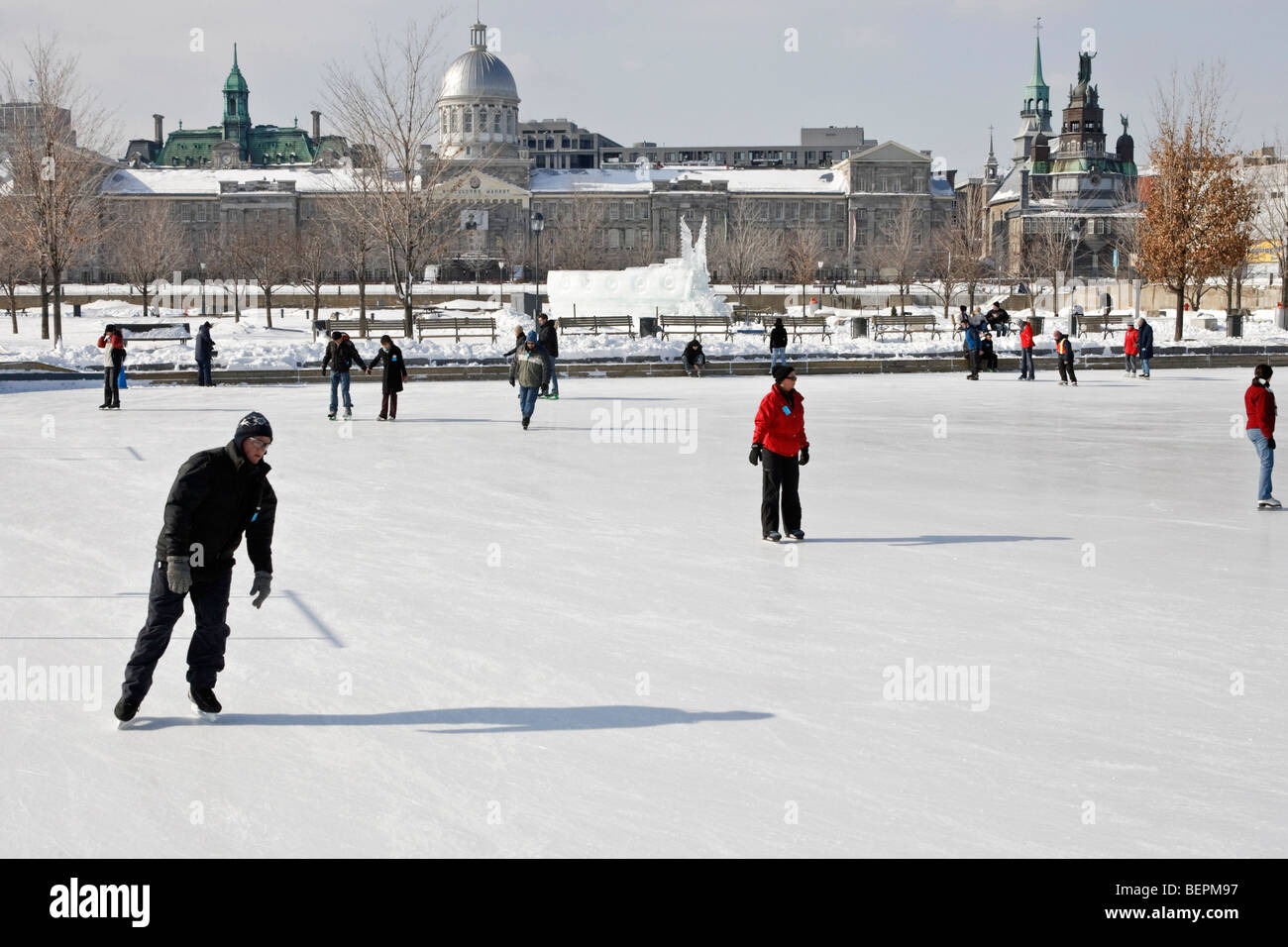 Outdoor ice skating during the day in the old port area of Montreal ...