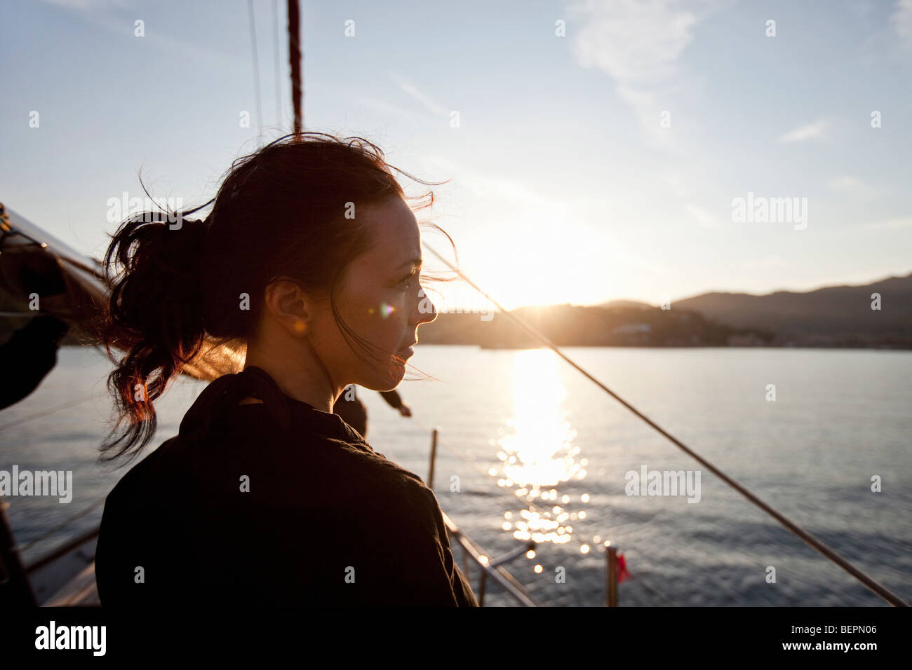 Sailing Boat At Sunset Stock Photos & Sailing Boat At Sunset Stock ...