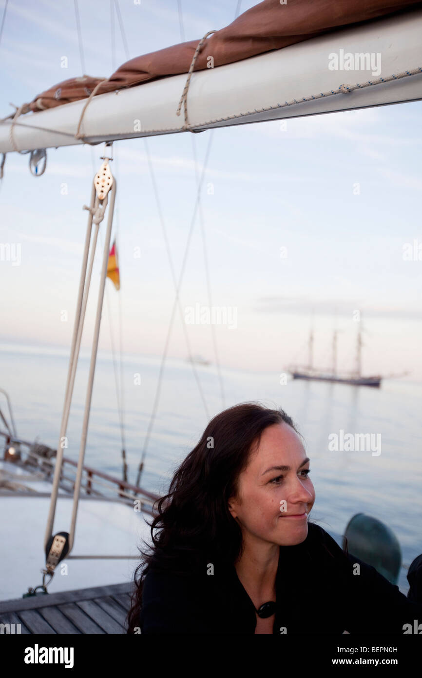 woman on a boat smiling Stock Photo - Alamy