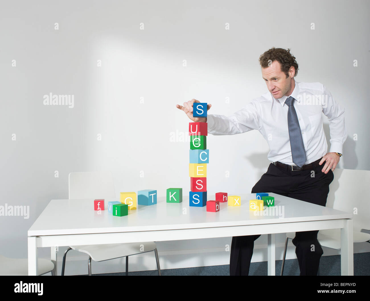 Building blocks and businesspeople hi-res stock photography and images ...