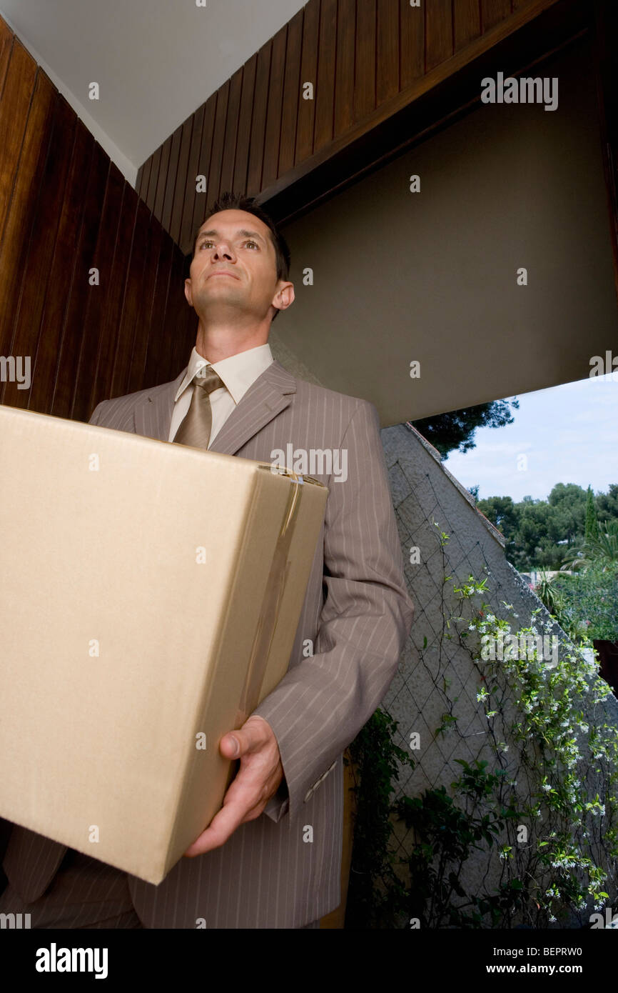 business man moving in a new house Stock Photo - Alamy