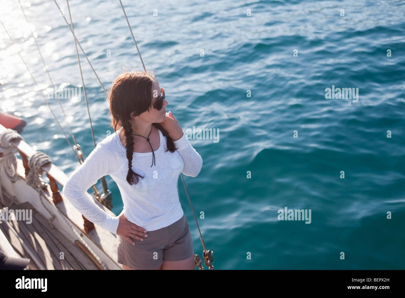 Woman watching boat hi-res stock photography and images - Alamy