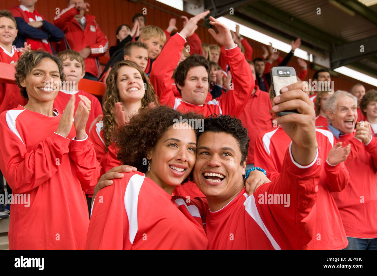 Football fans photographing themselves Stock Photo - Alamy
