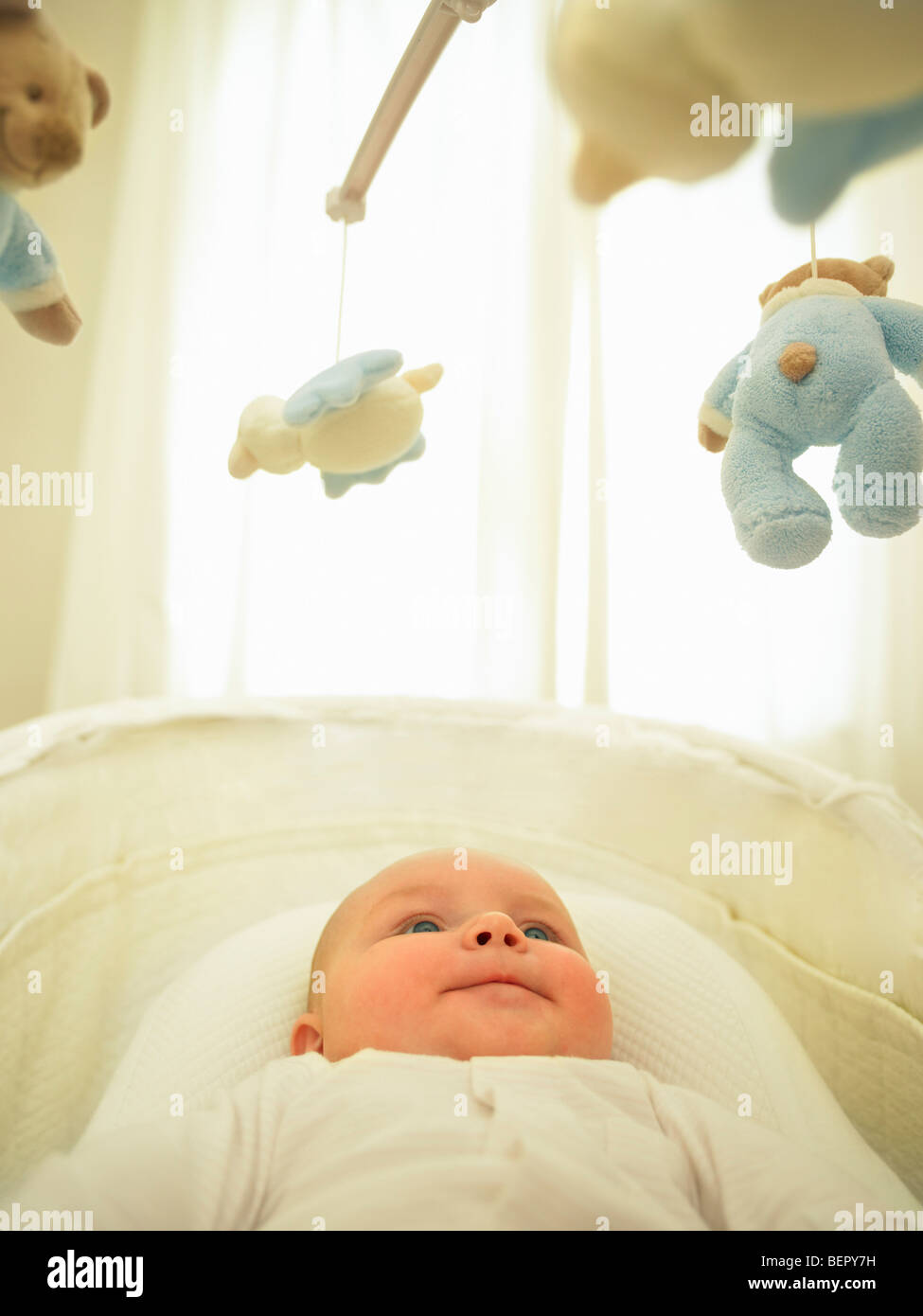 baby looking at mobile Stock Photo - Alamy