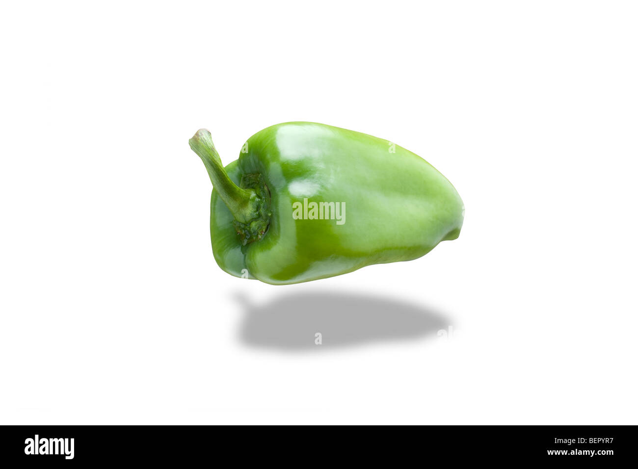 Floating clean green bell pepper on white background with nice shadow ...