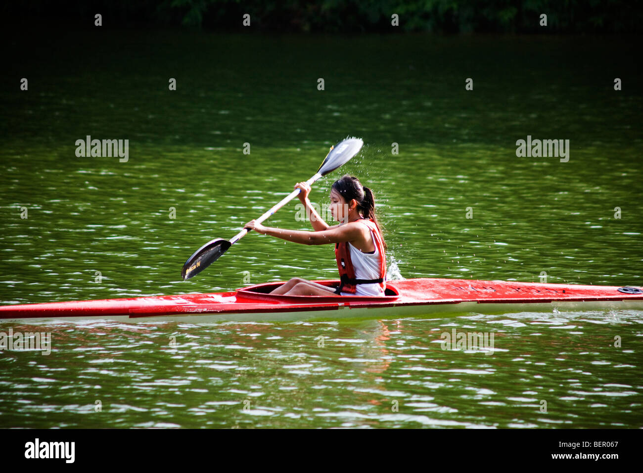 Girl canoeing on the MacRitchie Reservoir, Singapore Stock Photo - Alamy