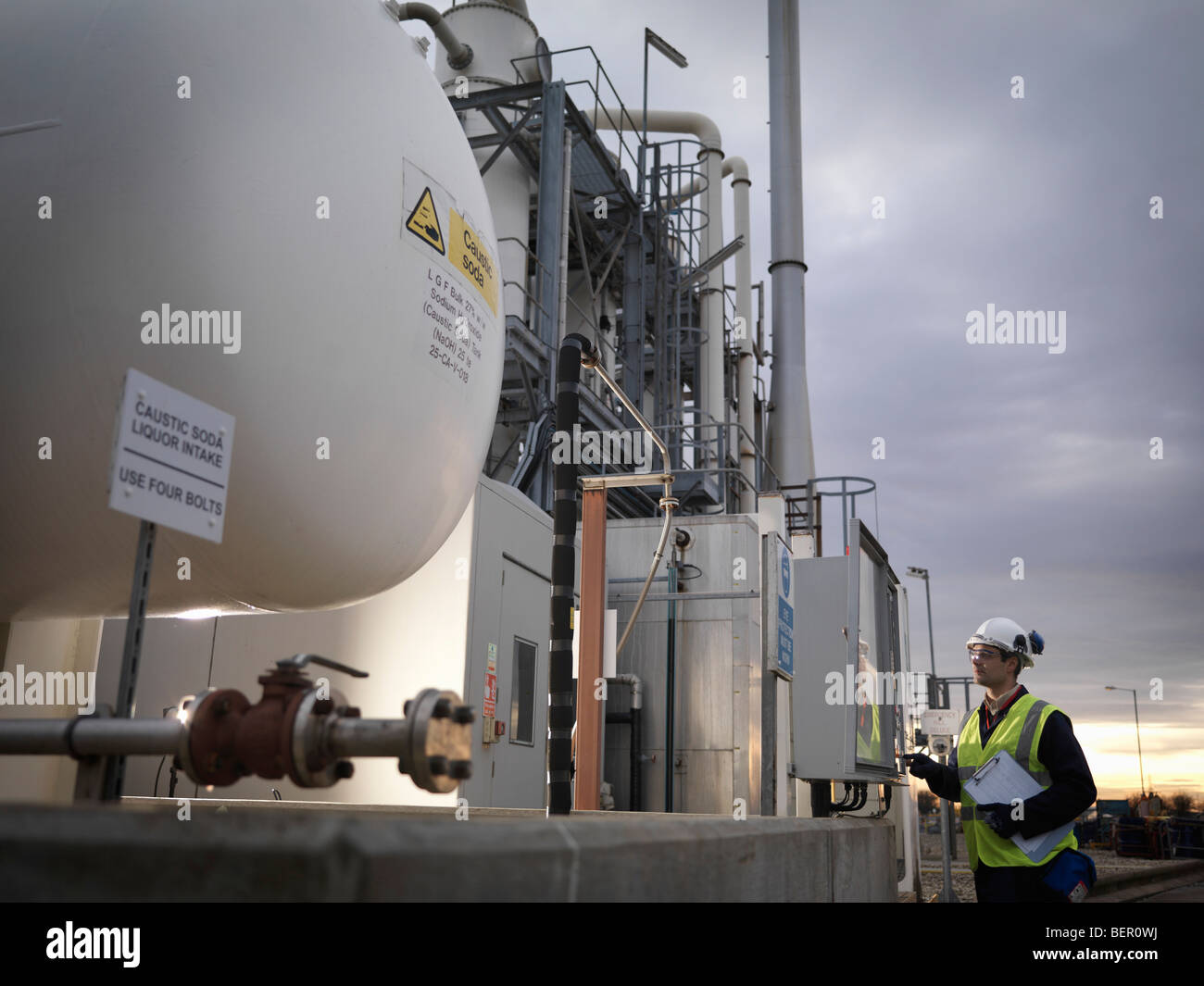 Port Worker At Control Panel Stock Photo - Alamy