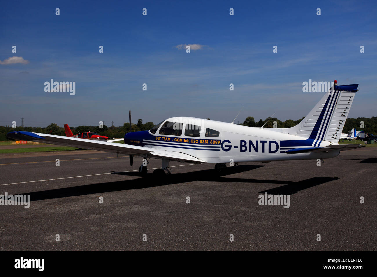 In blue and white livery,the Piper Warrior aircraft, stationed at ...