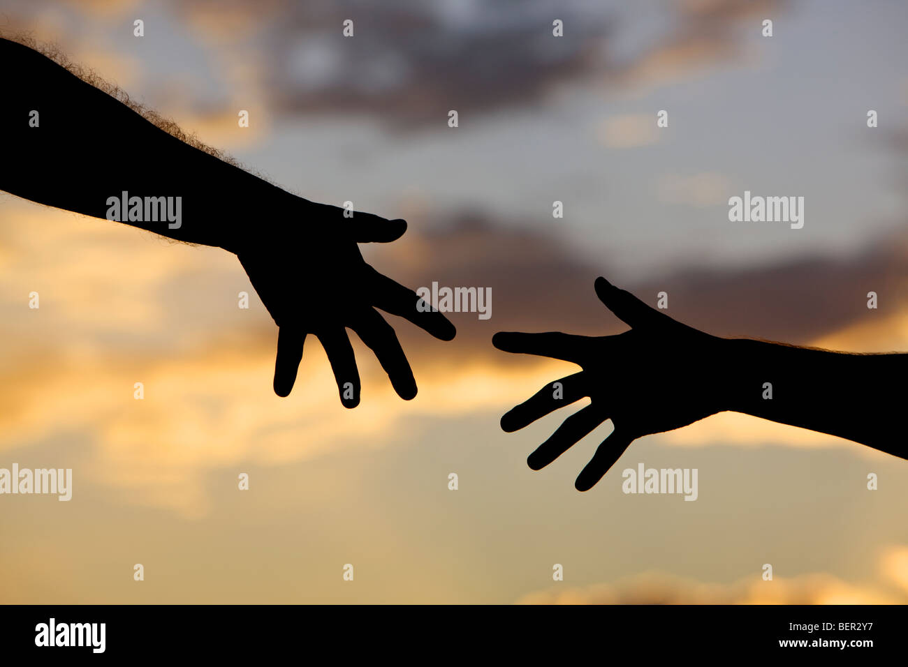 Hand reaching out or pulling away Stock Photo - Alamy