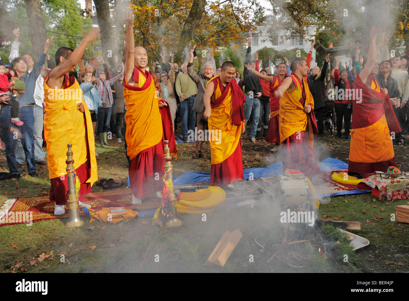 Tibetan monks tossing sand during purification ceremony-Victoria ...