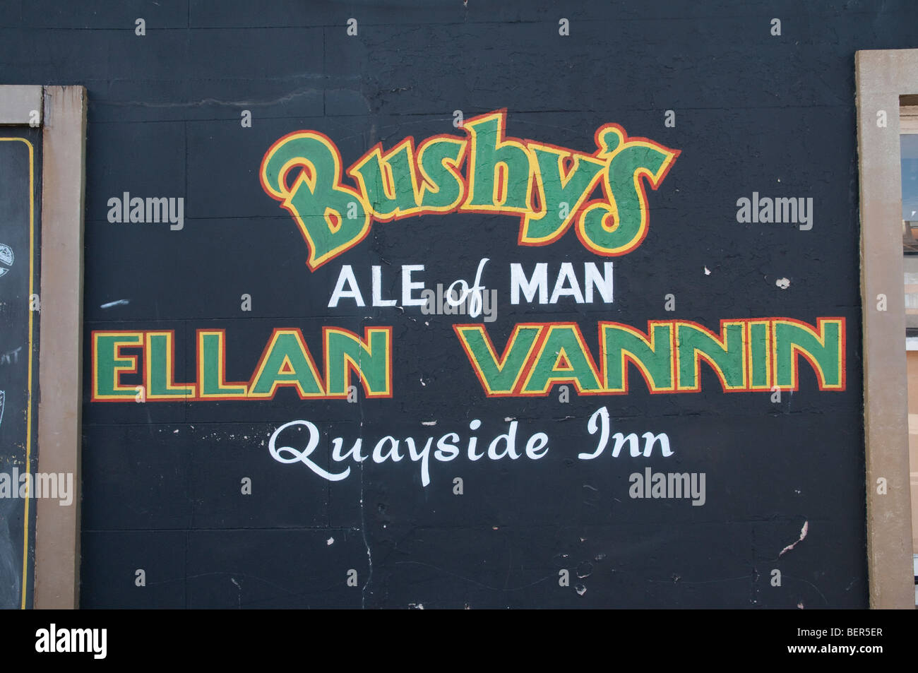 Sign painted on the side of the Ellan Vannin pub in Peel, Isle of Man ...