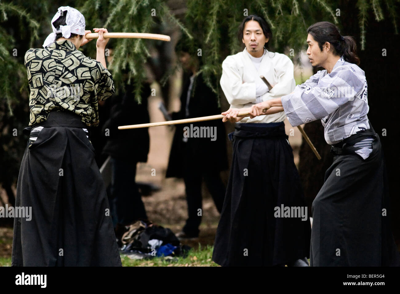 Young men practicing kendo outdoors in a public park in Tokyo Stock ...
