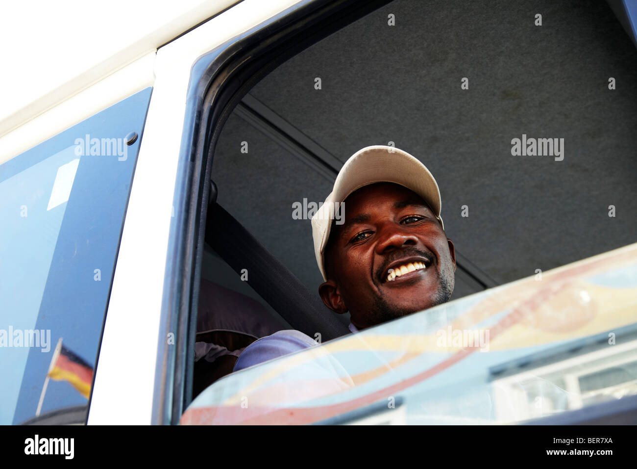 Namibian man in truck portrait Stock Photo - Alamy