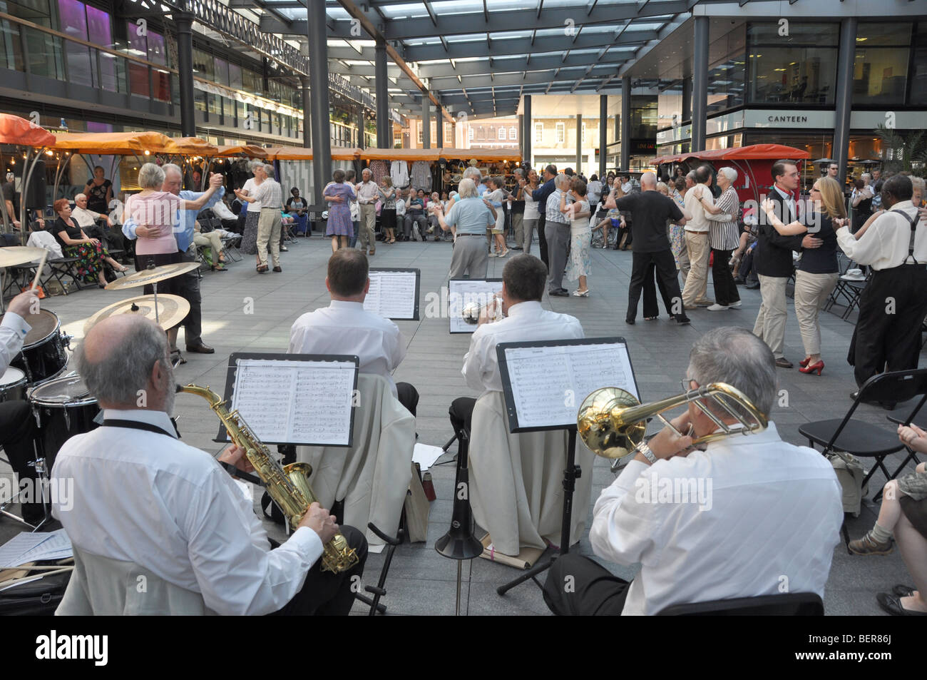 Afternoon dancing to live band at Spitalfields Market London England ...