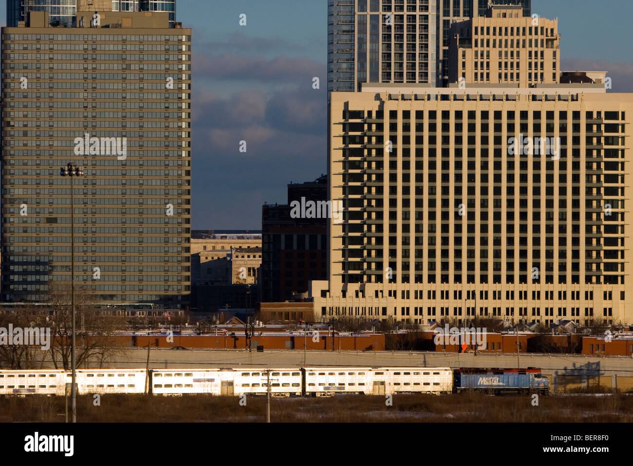 Gliding out of Chicago with a load of rush hour commuters, a Metra ...