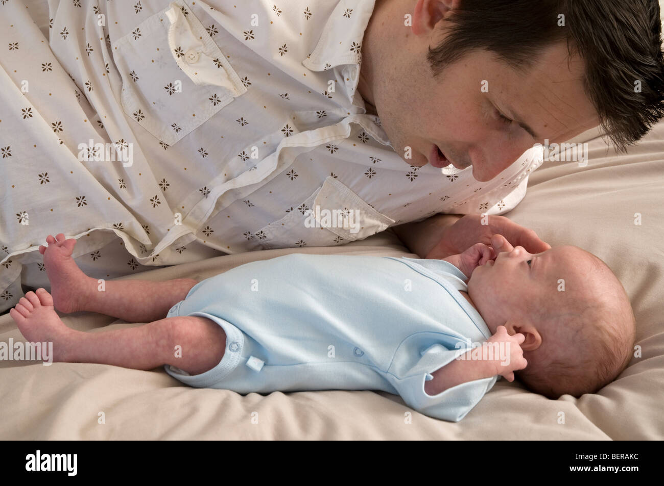 Adoringly hi-res stock photography and images - Alamy
