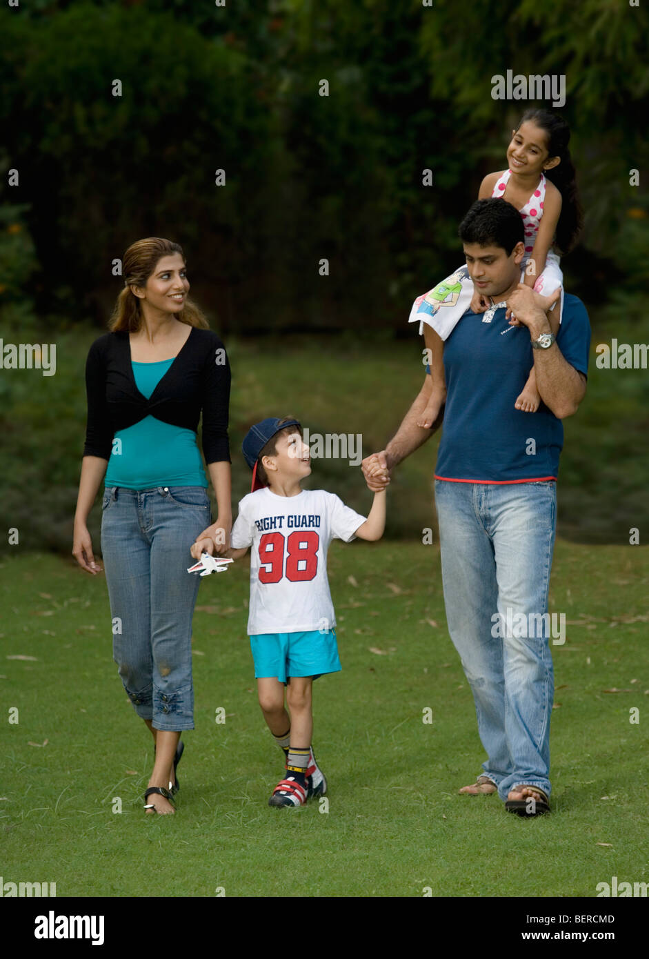 Family going for a walk Stock Photo - Alamy