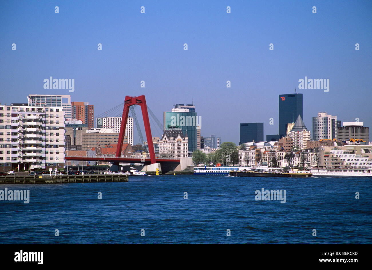 Willem Bridge and city skyline viewed from the port of Rotterdam, the ...
