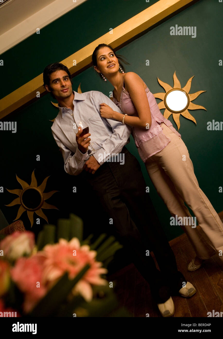 Couple standing together Stock Photo - Alamy