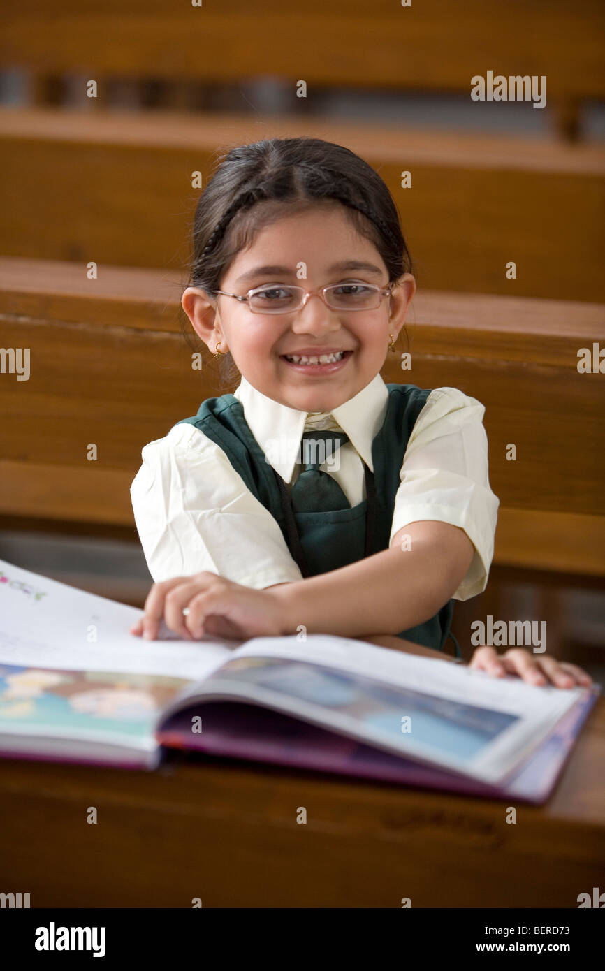 Student reading a book Stock Photo - Alamy