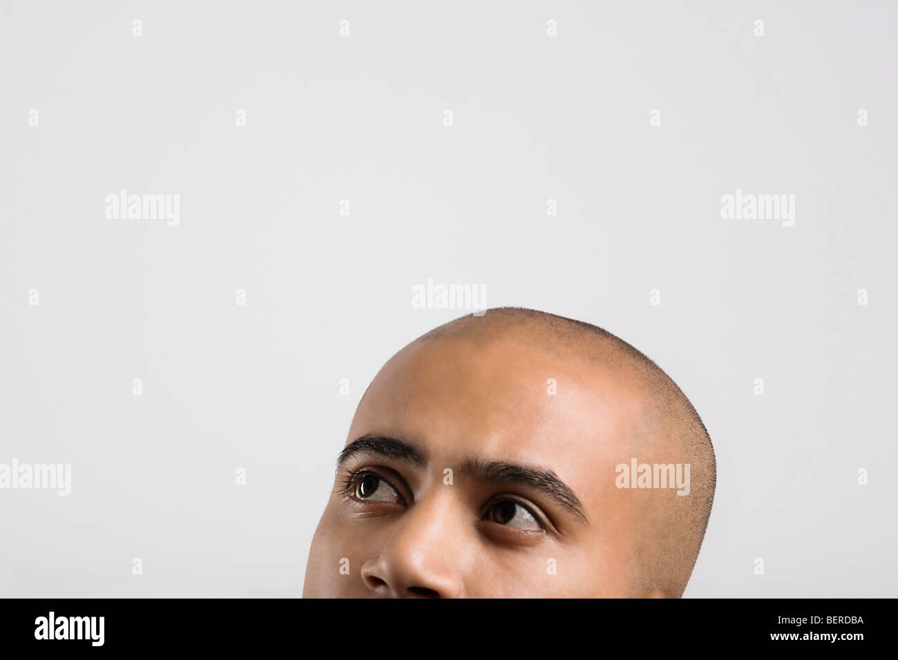 Man looking up Stock Photo - Alamy