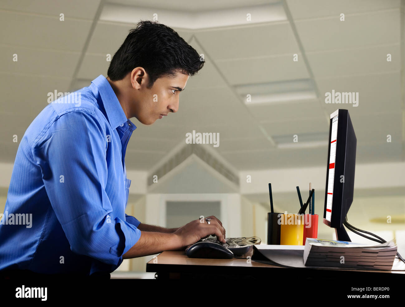 Executive working at his desk Stock Photo - Alamy