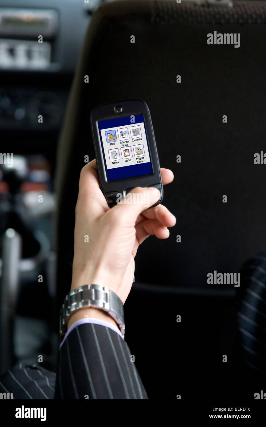 Man holding a mobile phone Stock Photo - Alamy