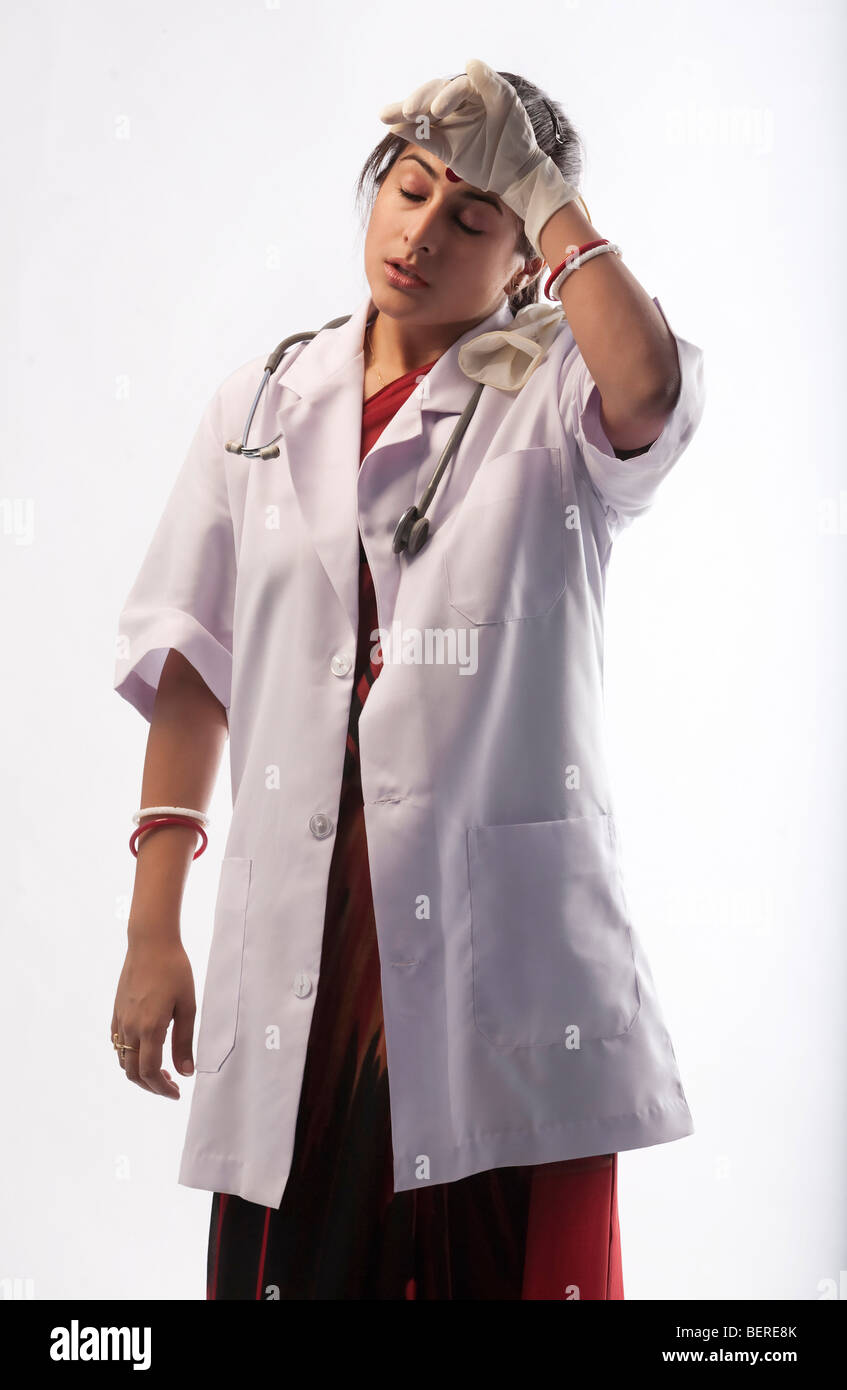 Tired doctor hi-res stock photography and images - Alamy