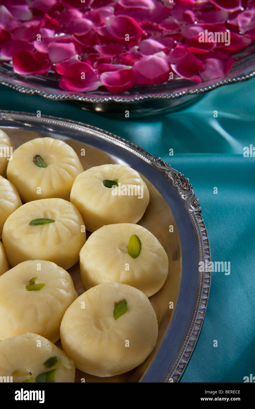 Sweets and flower petals Stock Photo - Alamy