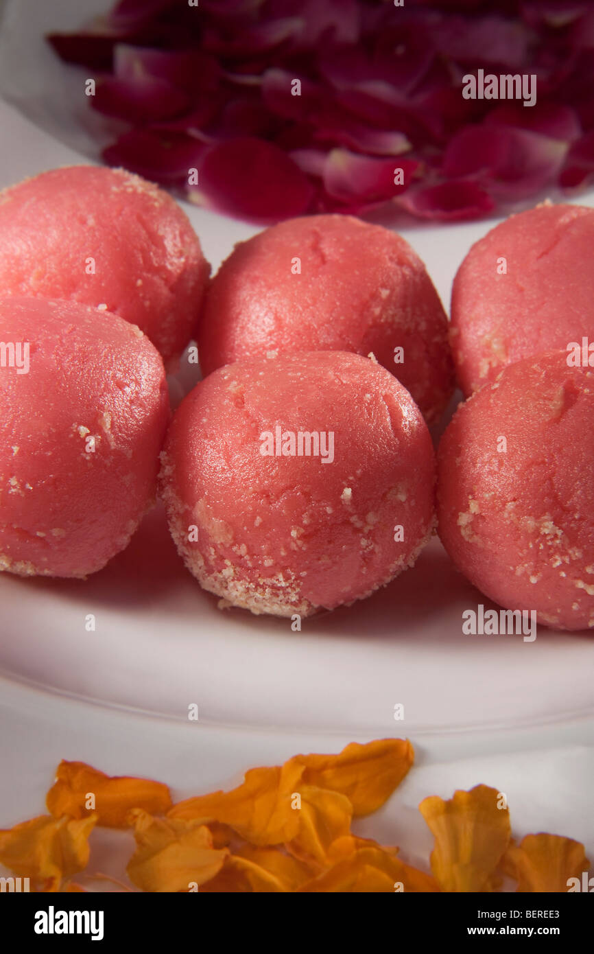 Sweets and flower petals Stock Photo - Alamy