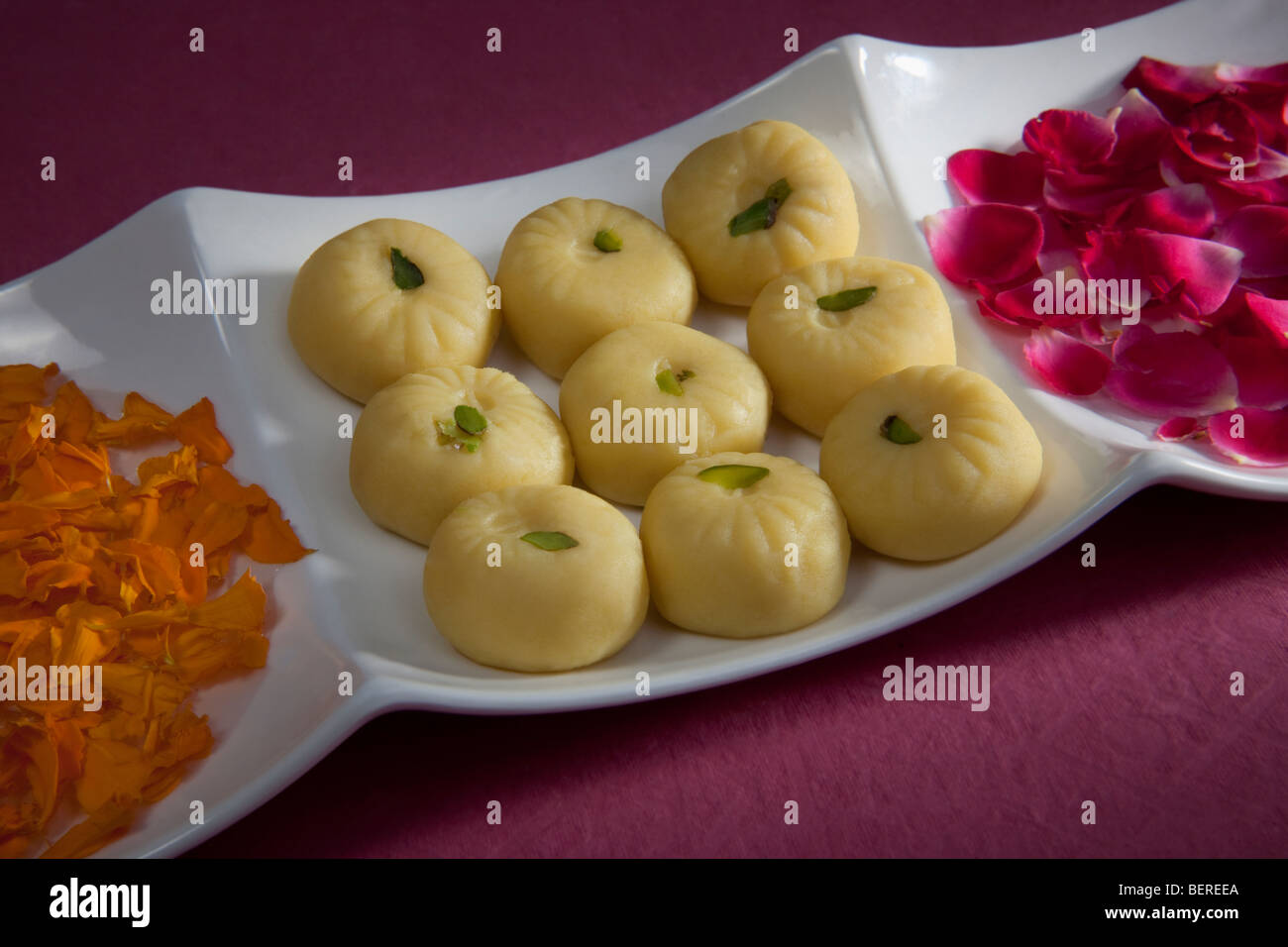 Sweets and flower petals Stock Photo - Alamy