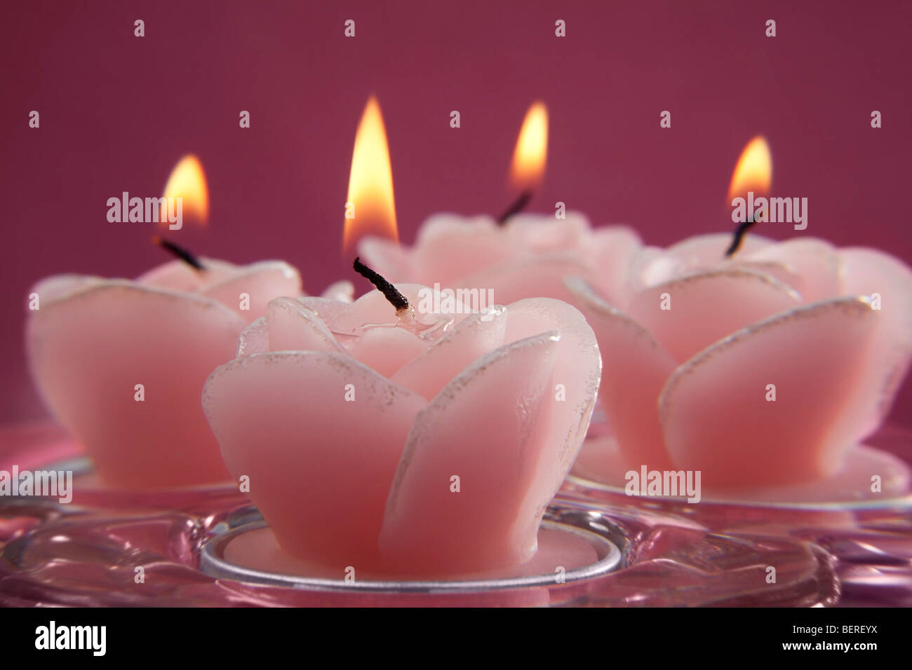 Decorative pink candles Stock Photo - Alamy