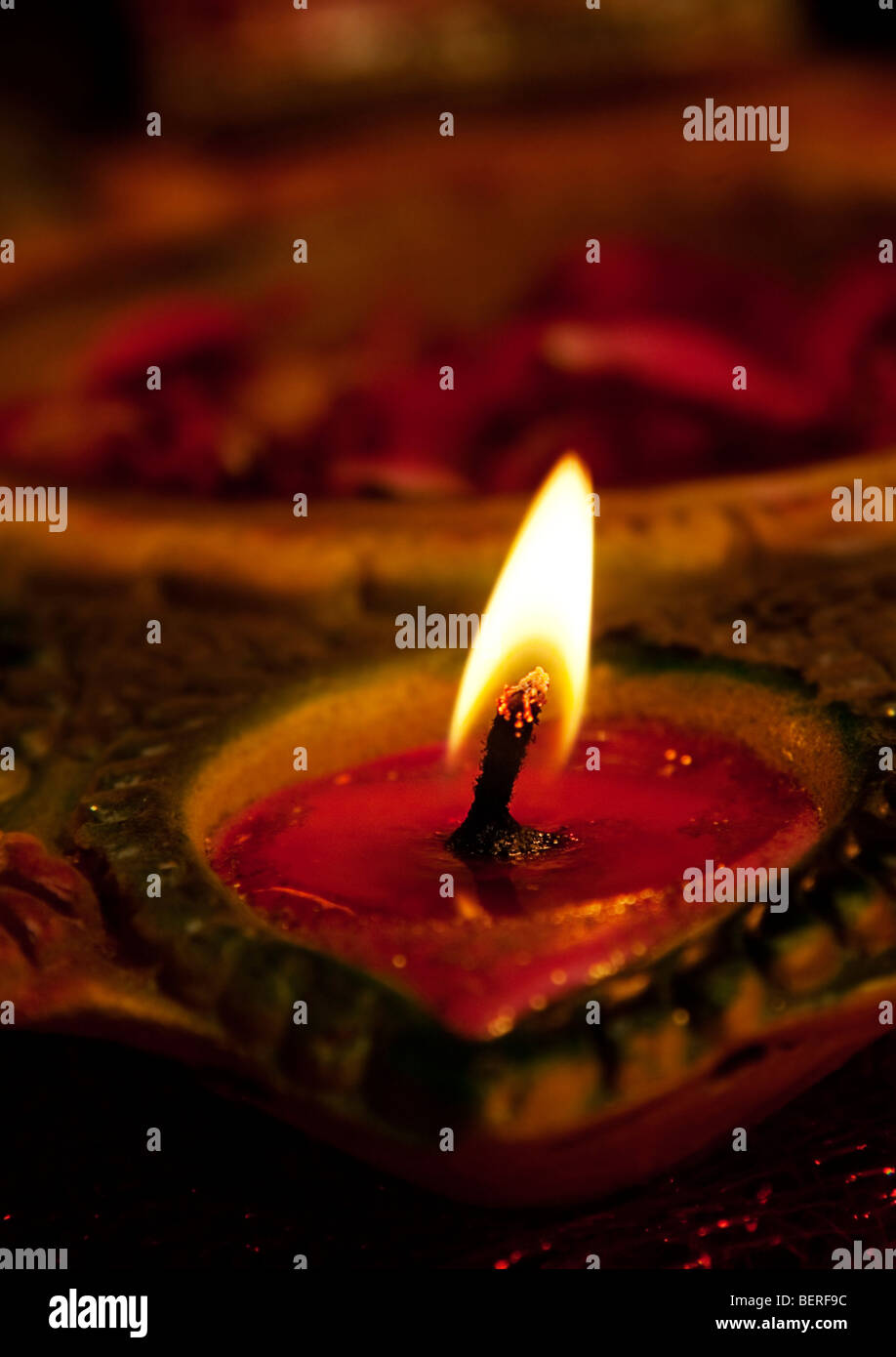 Light a diya candle hi-res stock photography and images - Alamy