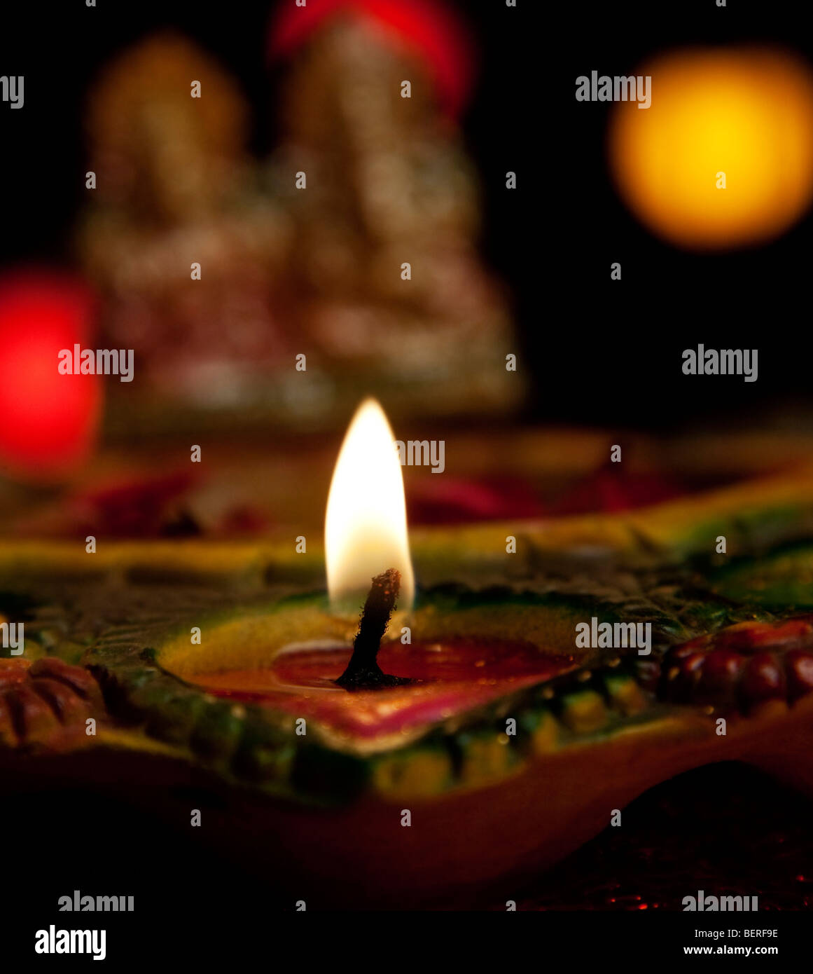 Light a diya candle hi-res stock photography and images - Alamy