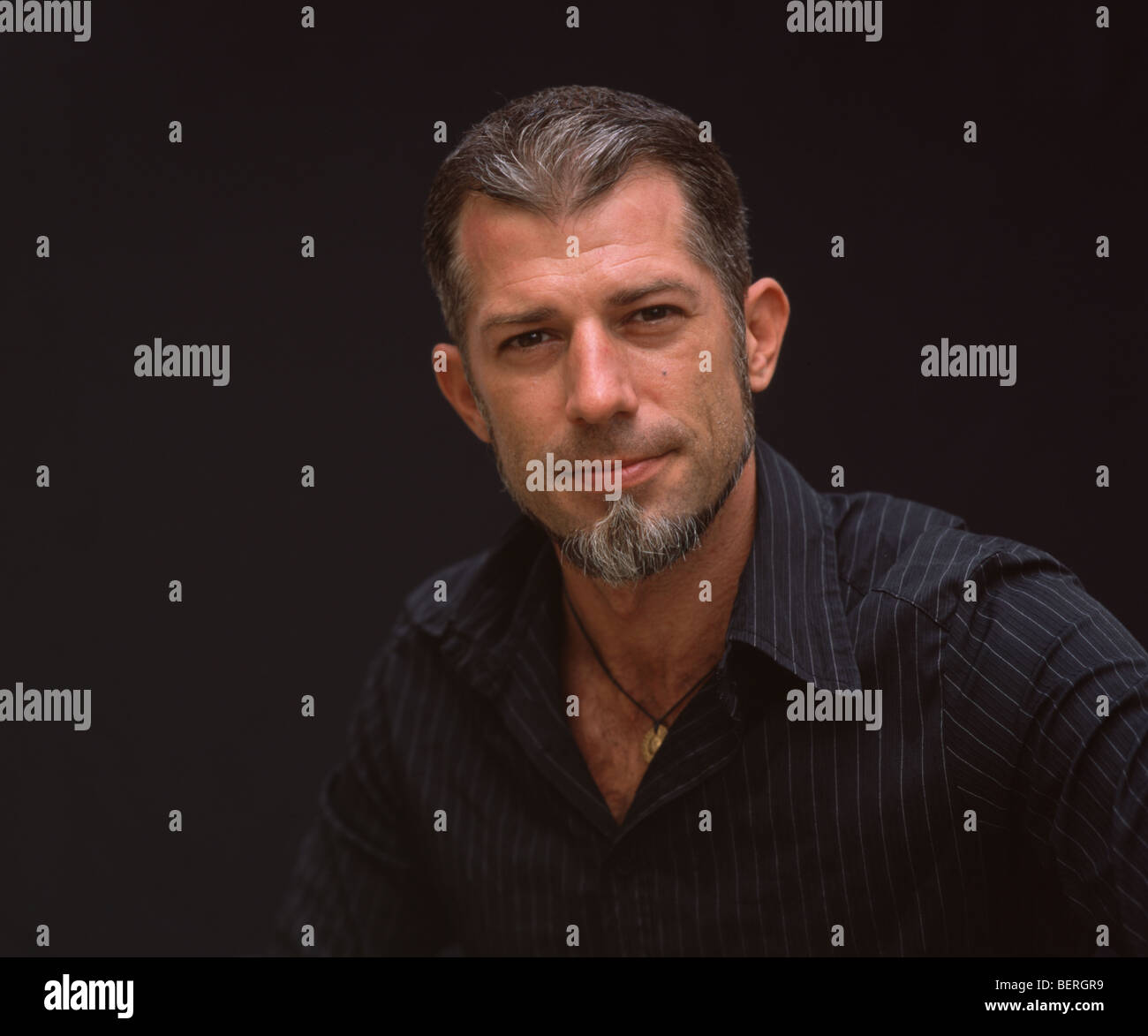 Handsome middle aged man with beard Stock Photo - Alamy