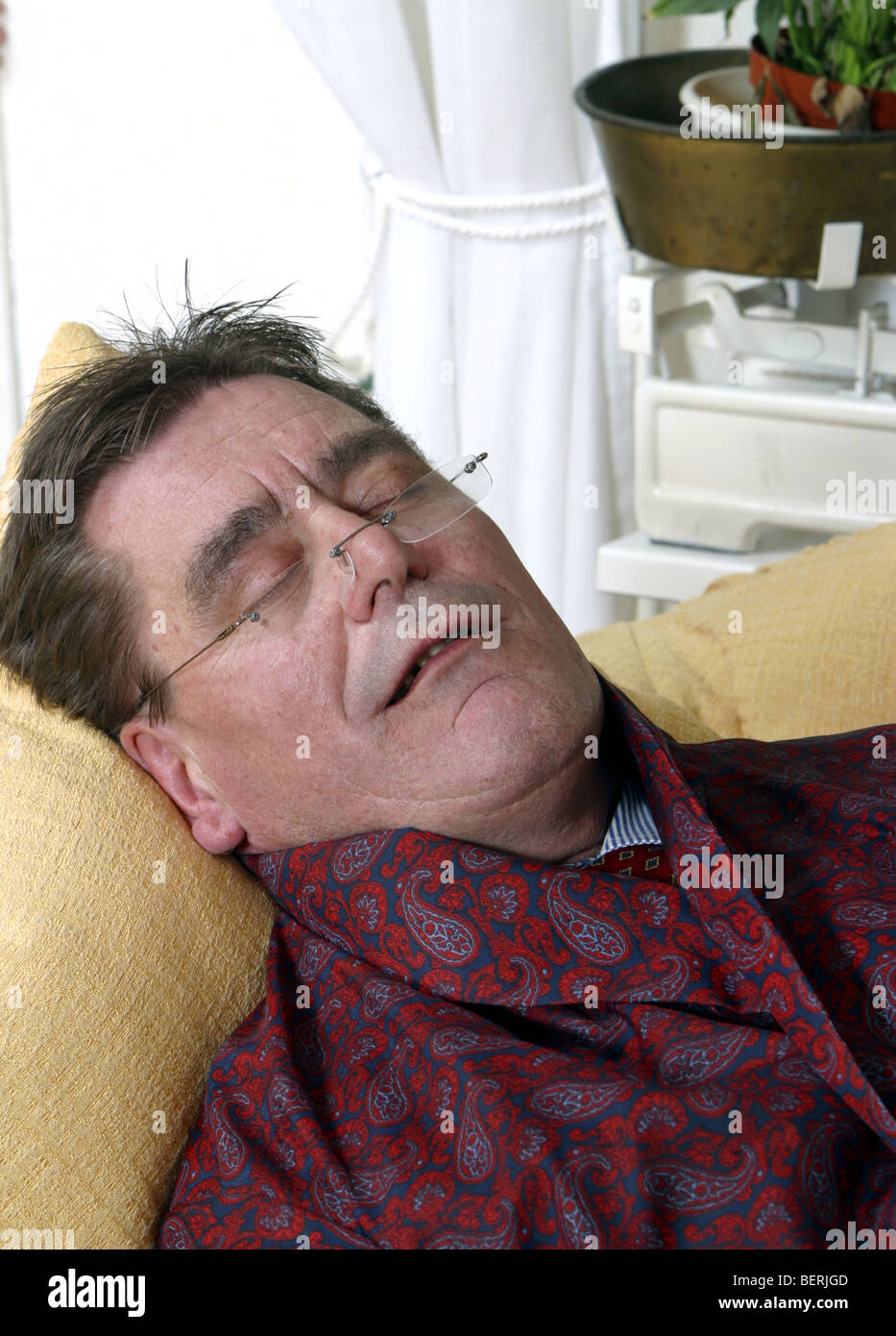 Snoring on the sofa hi-res stock photography and images - Alamy