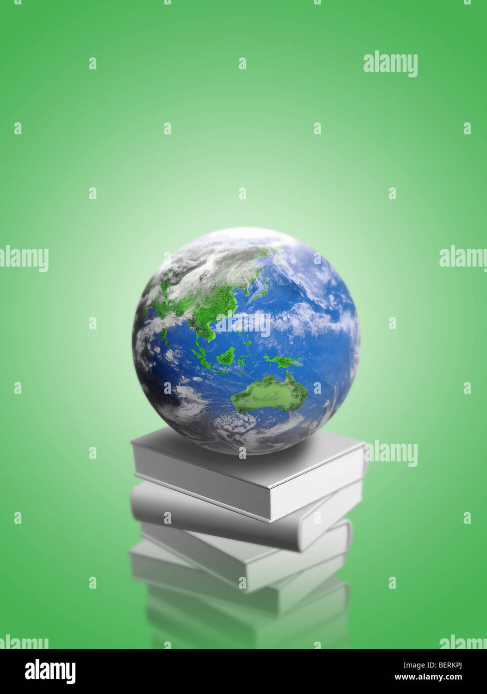 The earth placed on piled books, computer graphic, green background ...