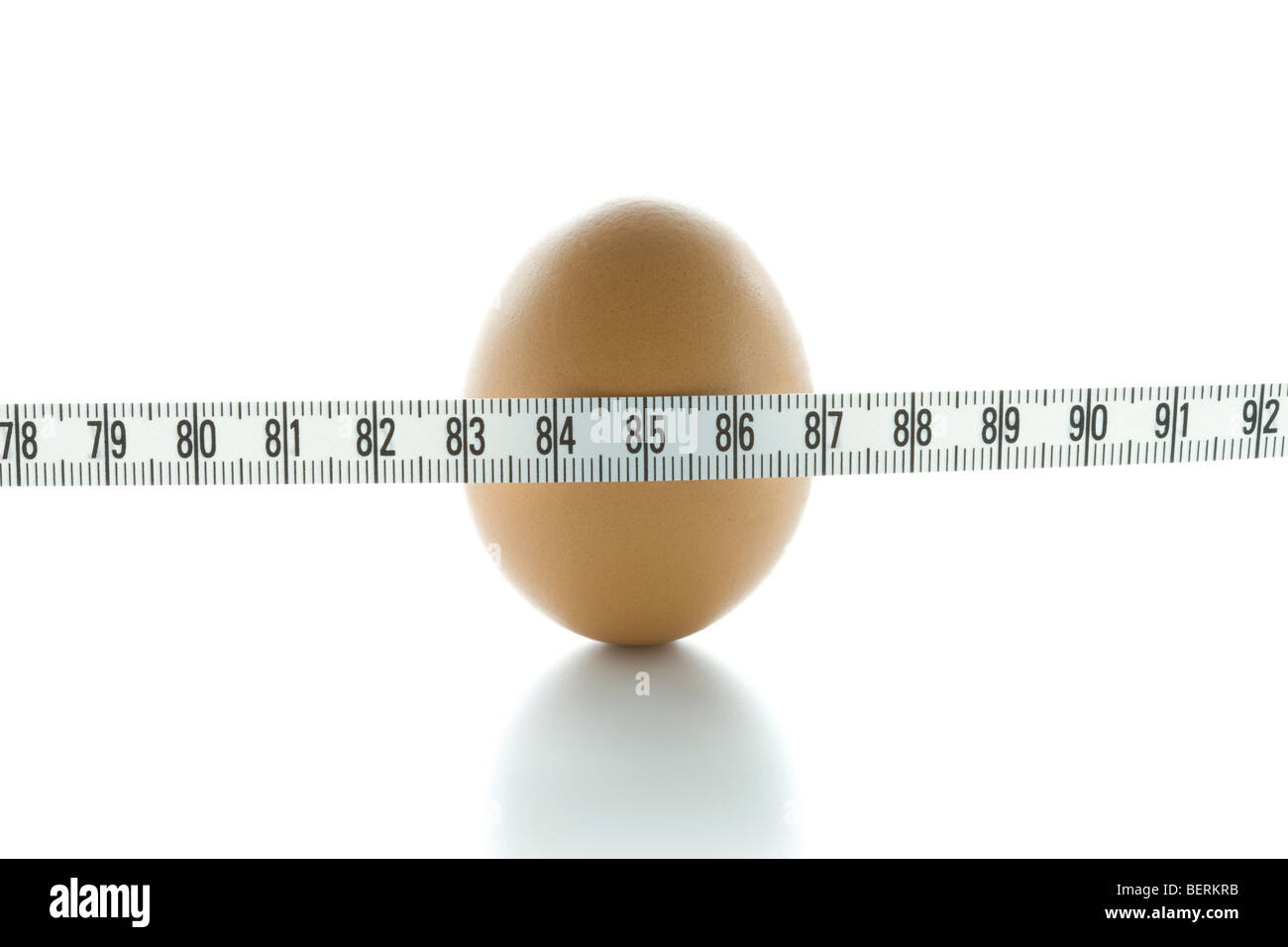 Tape Measure and Egg Stock Photo - Alamy