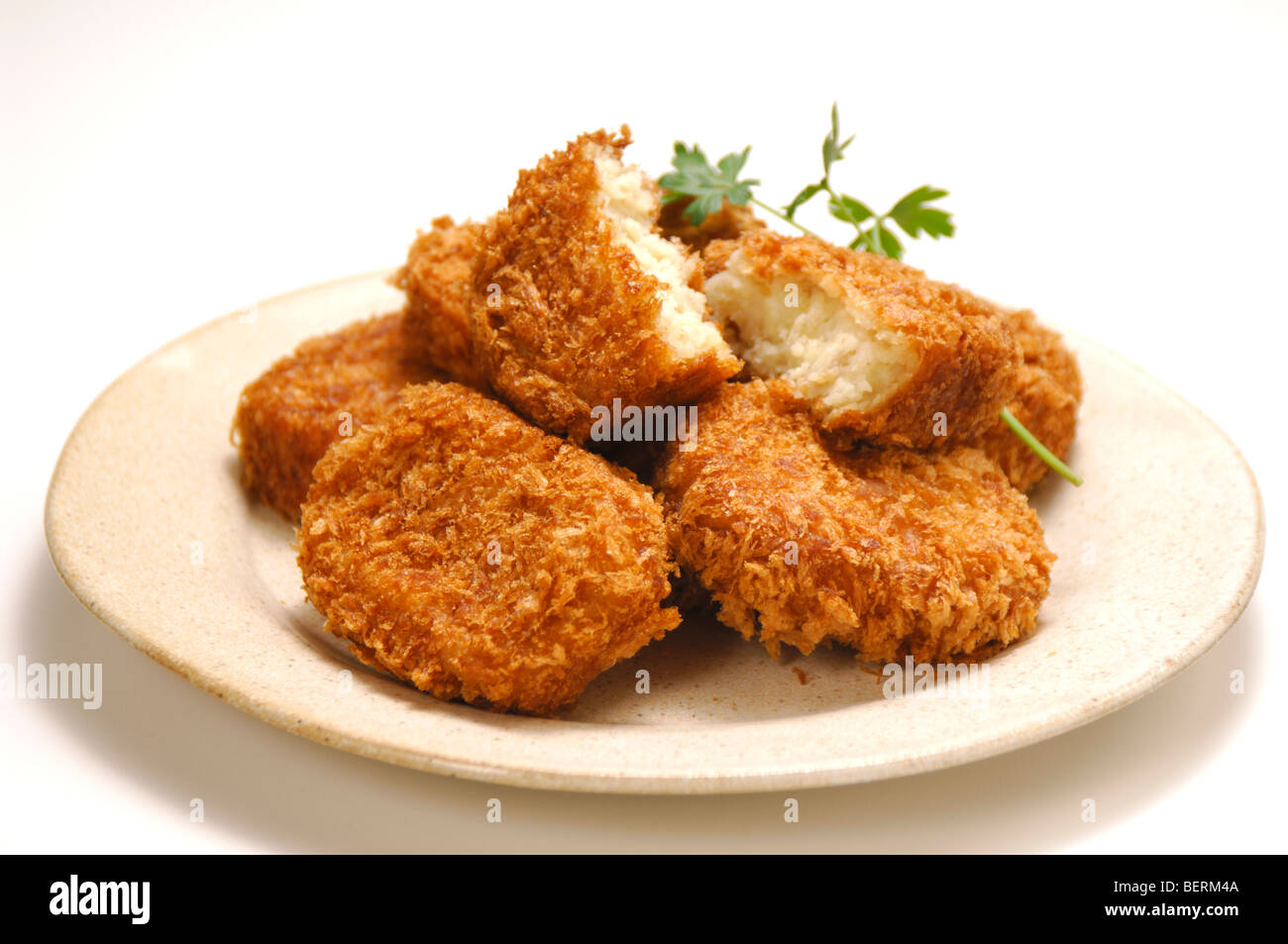 Plate of fried croquettes, close up, white background Stock Photo - Alamy