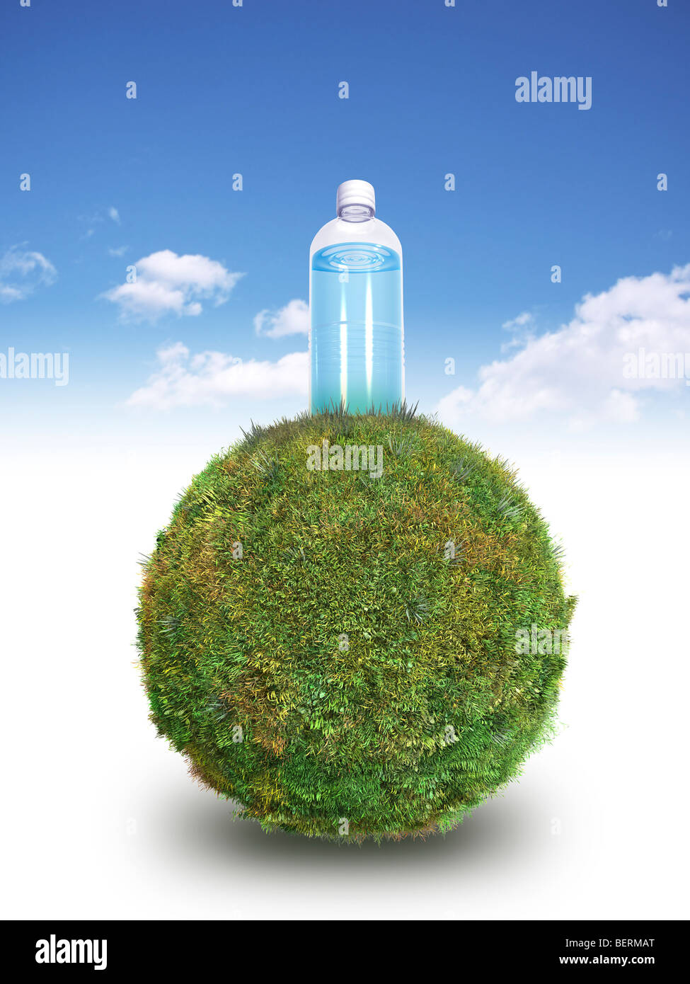 Bottle of water on grass covered sphere Stock Photo - Alamy