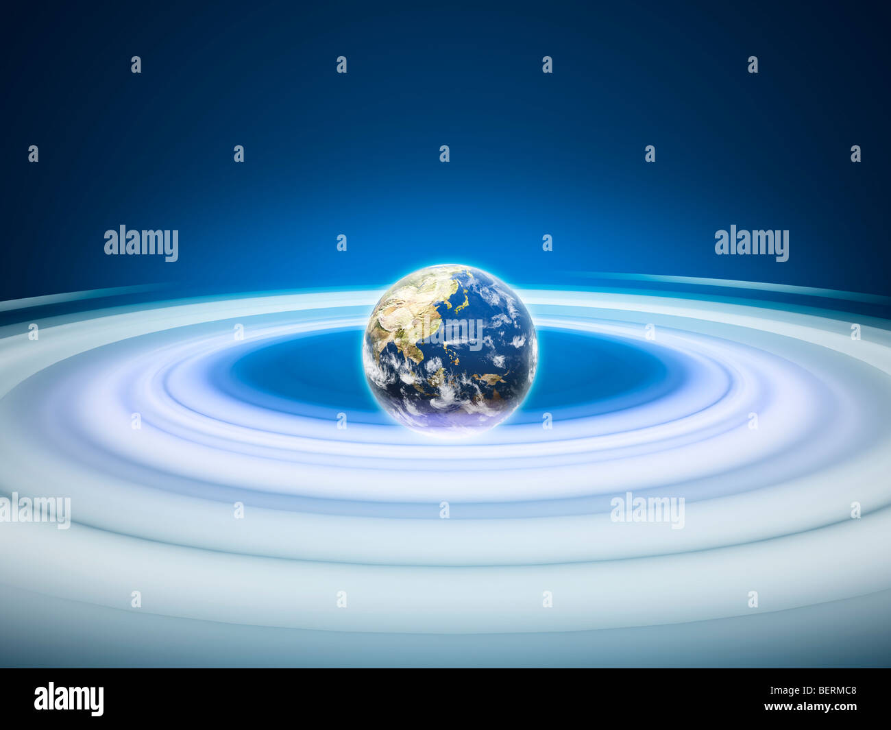 Planet earth surrounded by circle lights Stock Photo - Alamy
