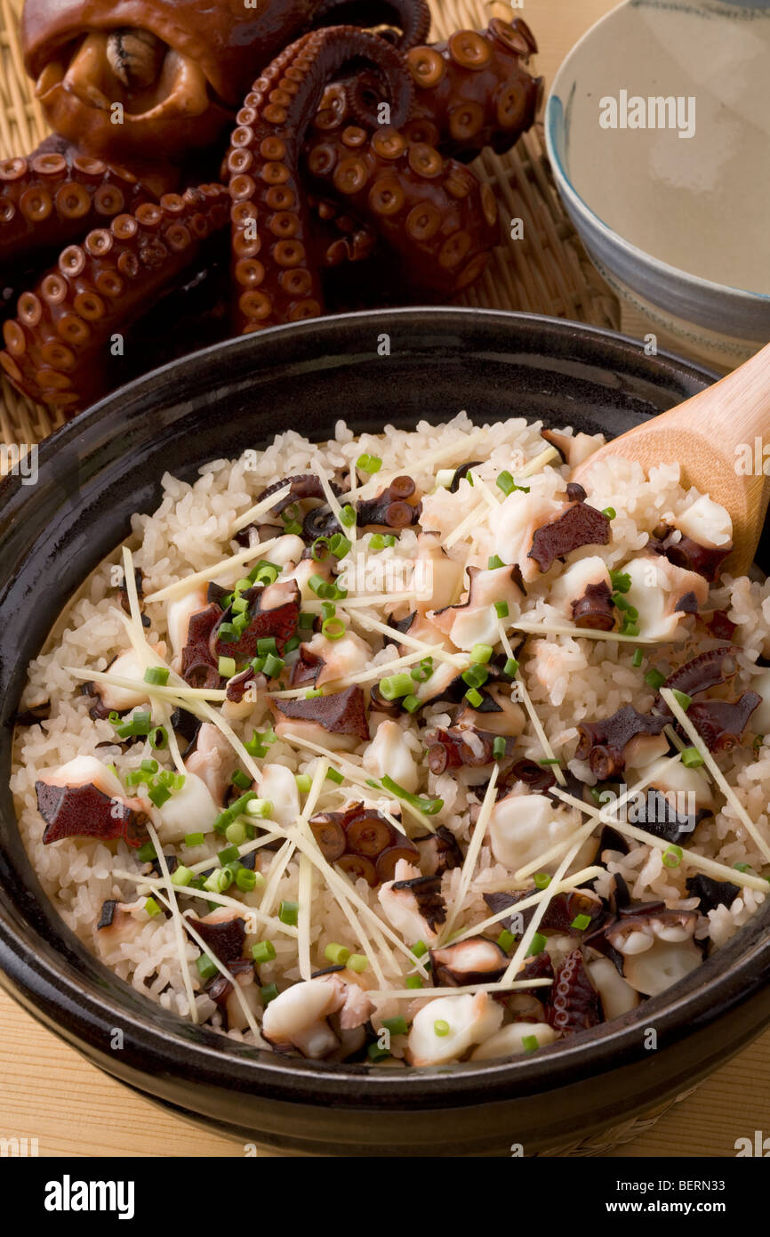 Rice cooked with slices of octopus Stock Photo - Alamy
