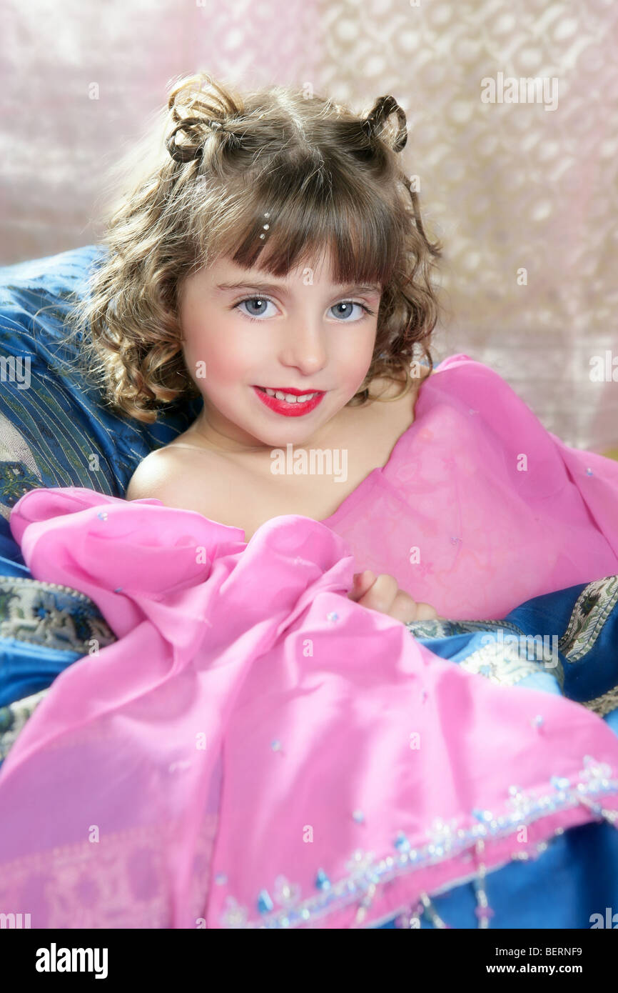 Beautiful little princess girl with magic atmosphere Stock Photo - Alamy
