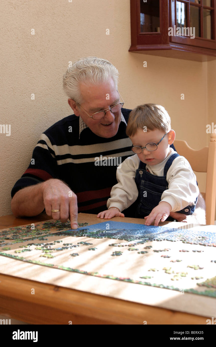 Children making a puzzle hi-res stock photography and images - Alamy