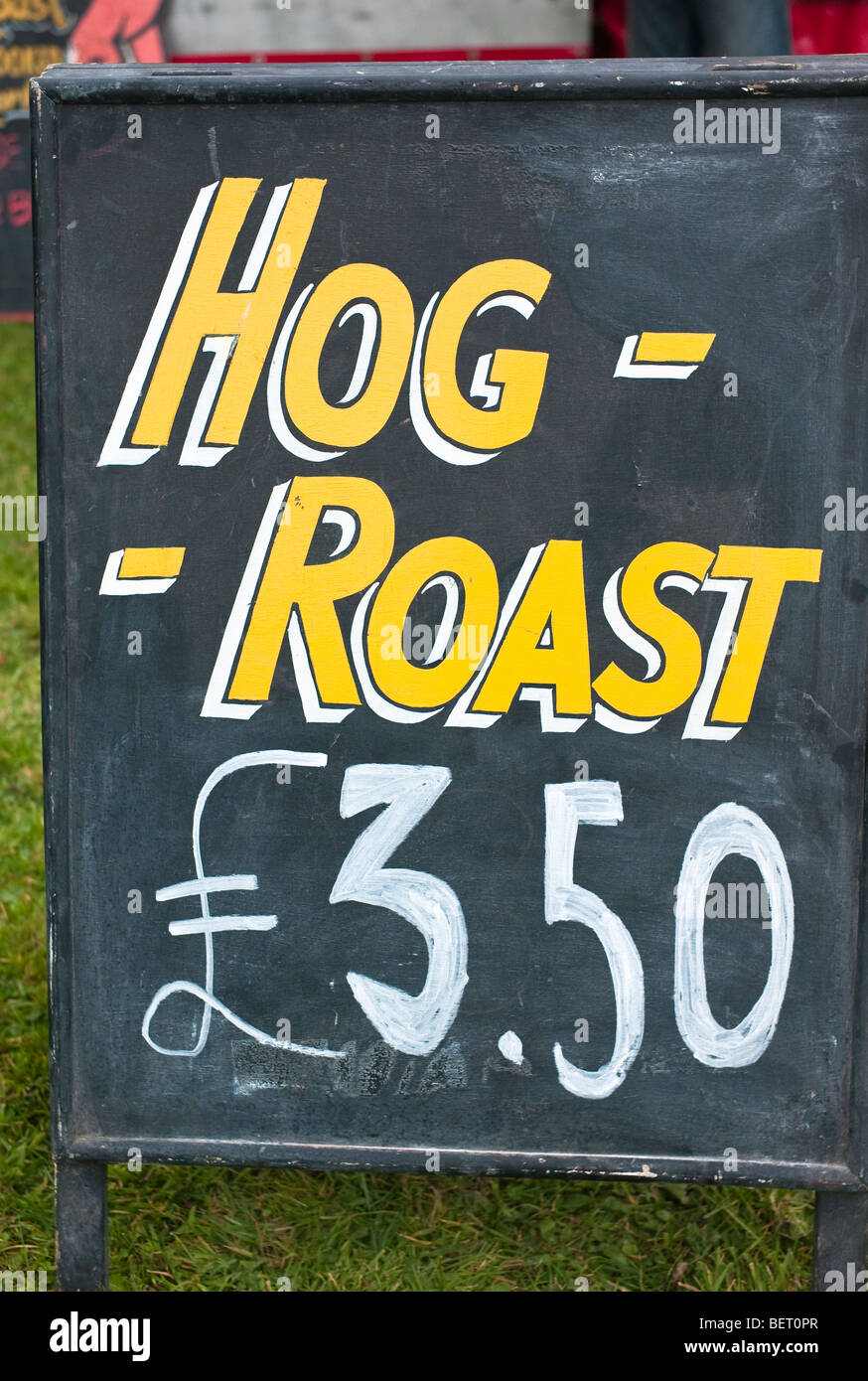 Hog Roast sign at outdoor event Stock Photo - Alamy