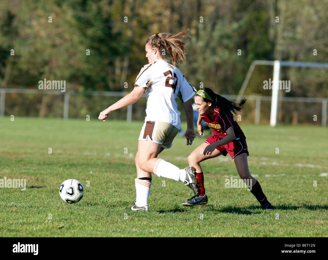 Girls playing soccer throw hi-res stock photography and images - Alamy