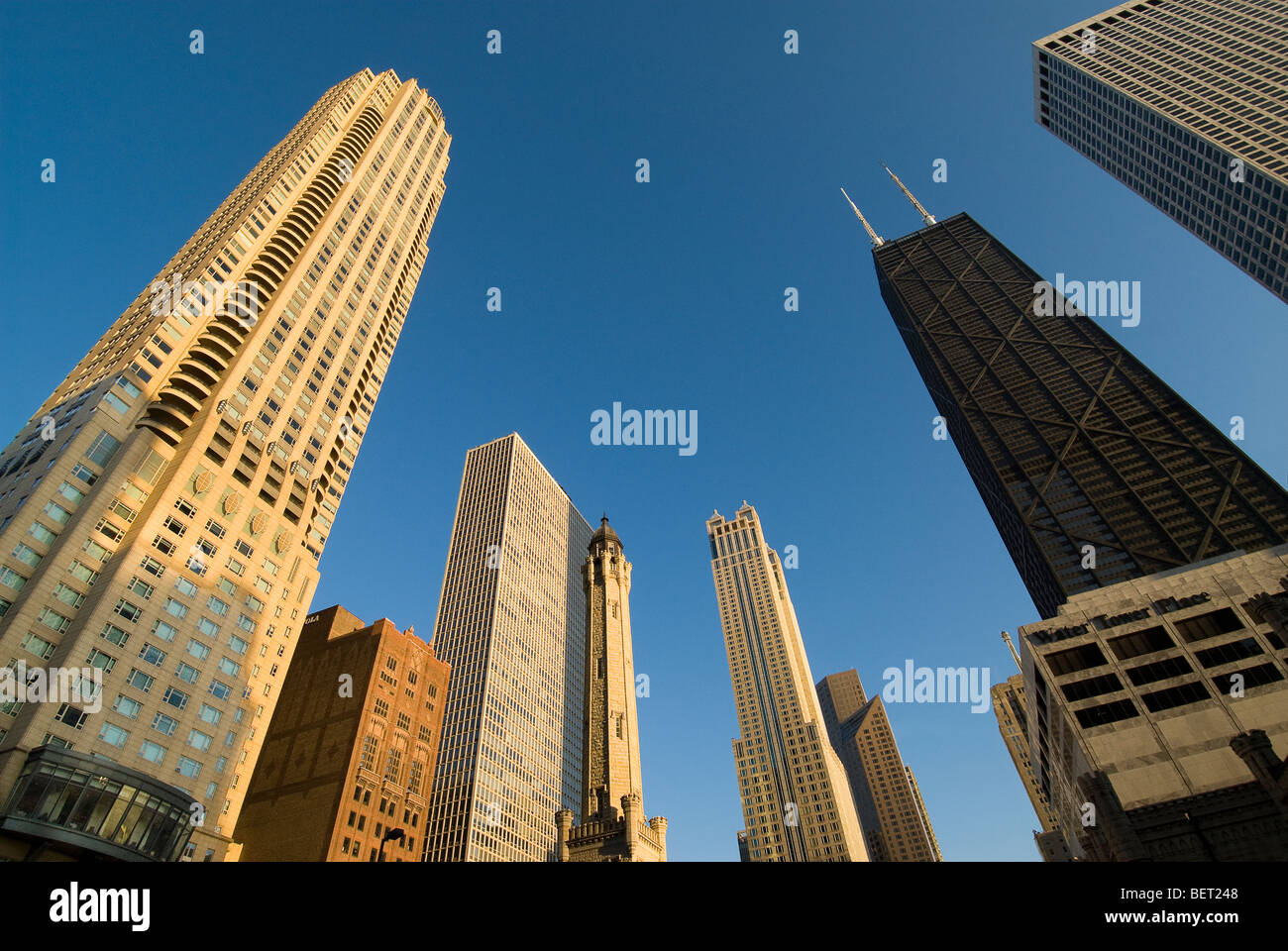 Low angle view of Old Chicago Water Tower and skyscrapers in Chicago ...