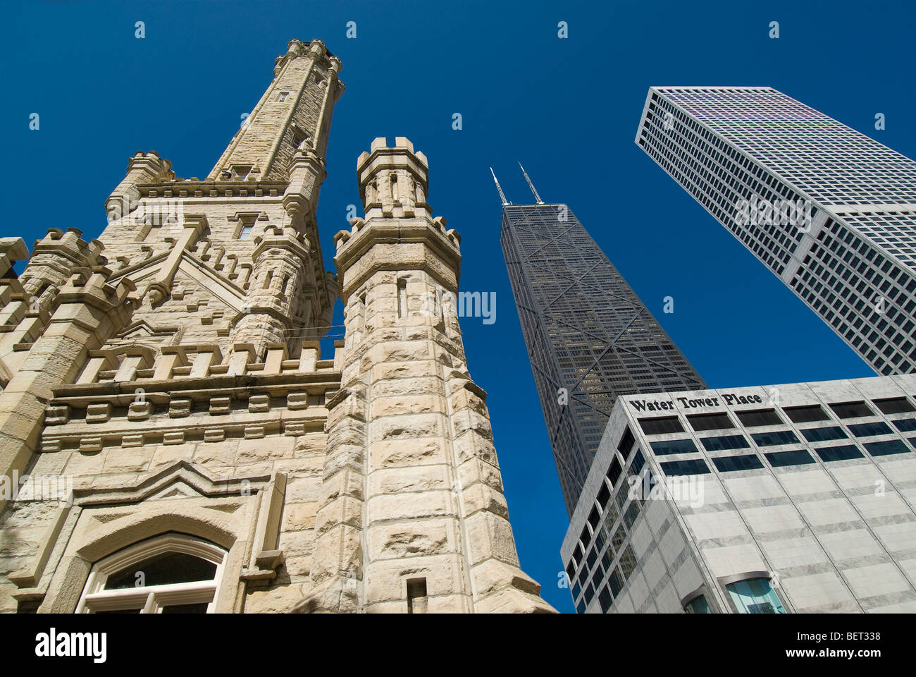 Low angle view of Old Chicago Water Tower and skyscrapers in Chicago ...